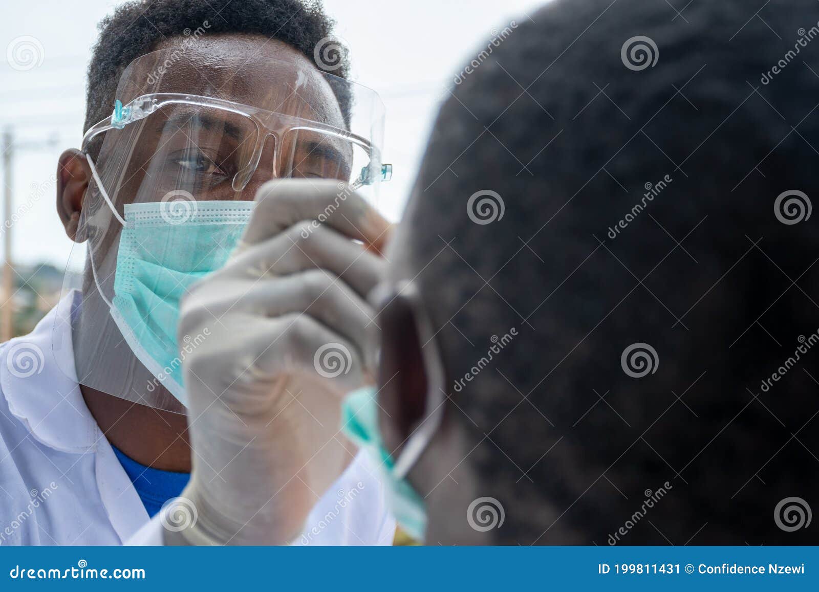 Taking Nasal Mucus Test Sample From Elementary Age Girl`s Nose ...