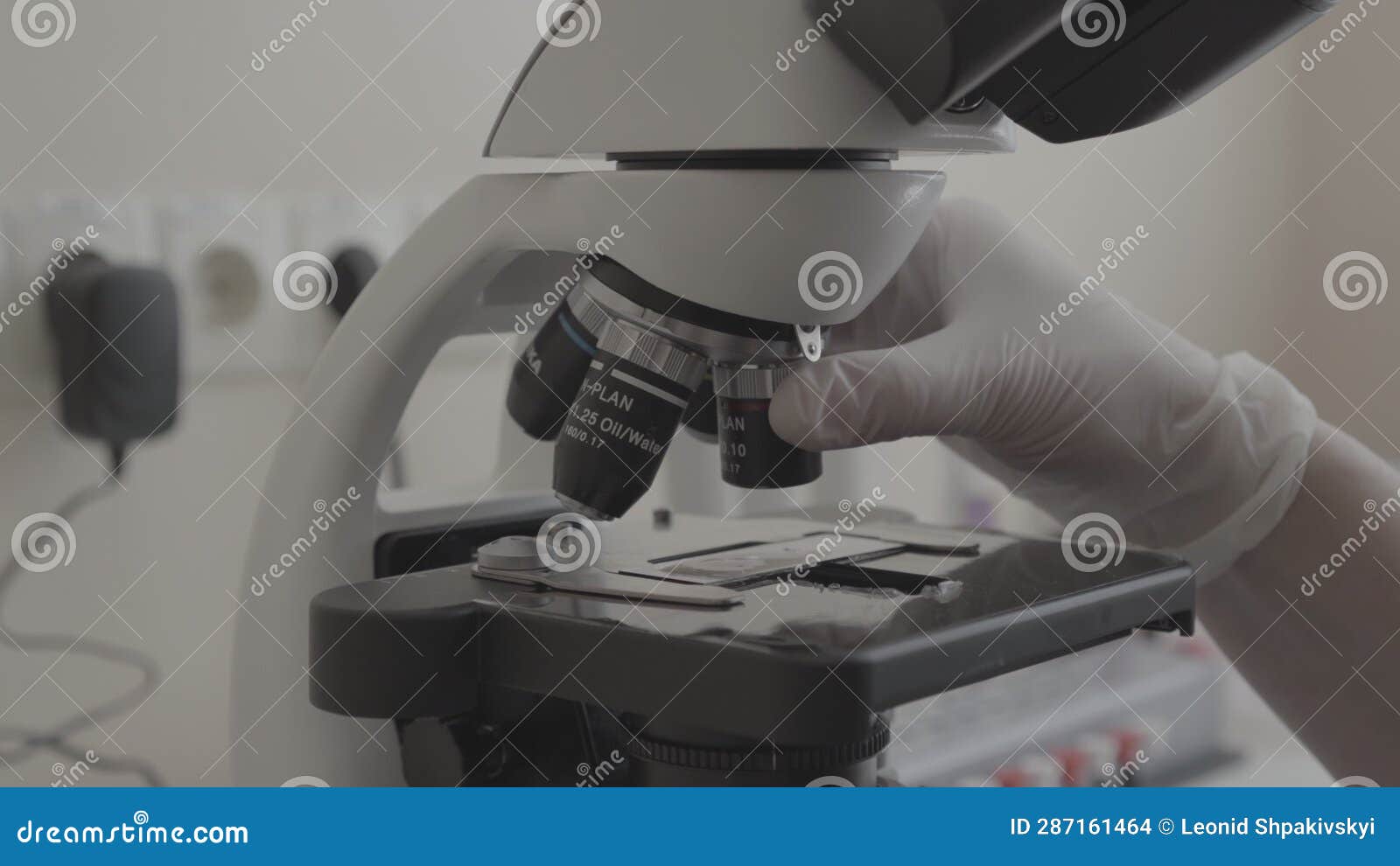 Lab Technician Adjusting Microscope. Close-up Stock Footage - Video of ...