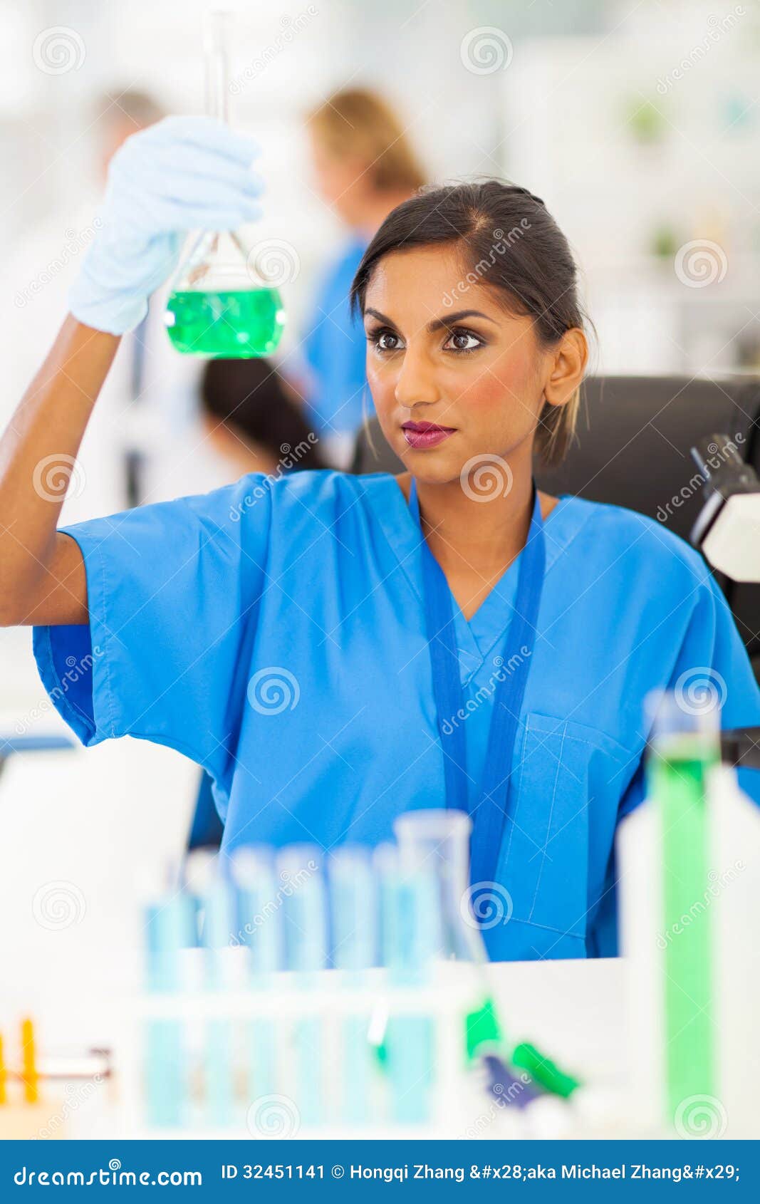 Lab technician analyzing stock image. Image of clinician - 32451141