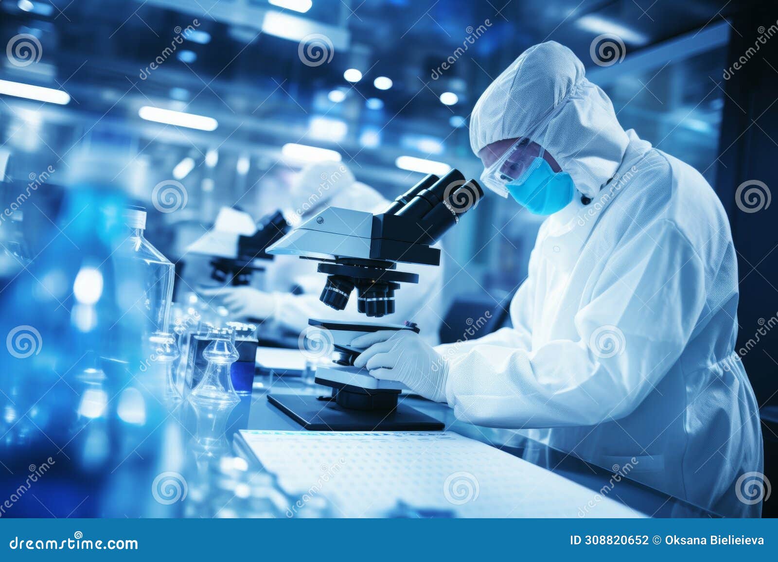 Lab Technician Analyzing Biomaterial Samples Under Microscope ...