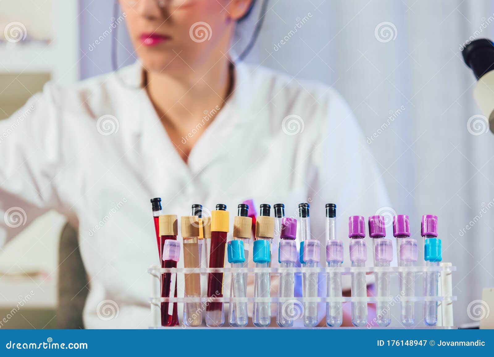 Lab Technician Assistant Analyzing a Blood Sample in Test Tube at ...