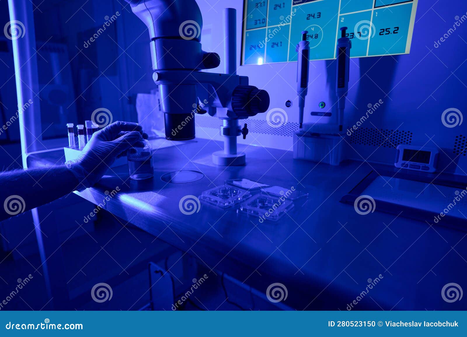 Lab Technician Cleaning Workplace after Researching Under Microscope ...