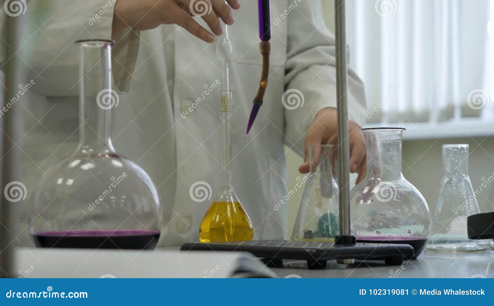 Lab Technician Doing Experiment in Lab. Male Medical or Scientific ...