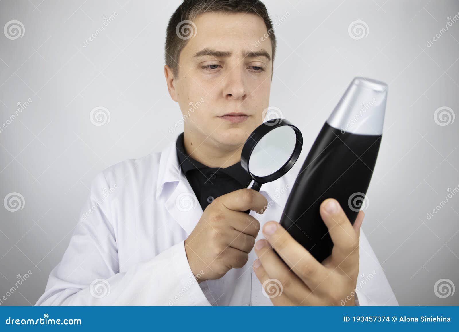 A Lab Technician Examines a Sample of Shampoo he Was Given for Analysis ...