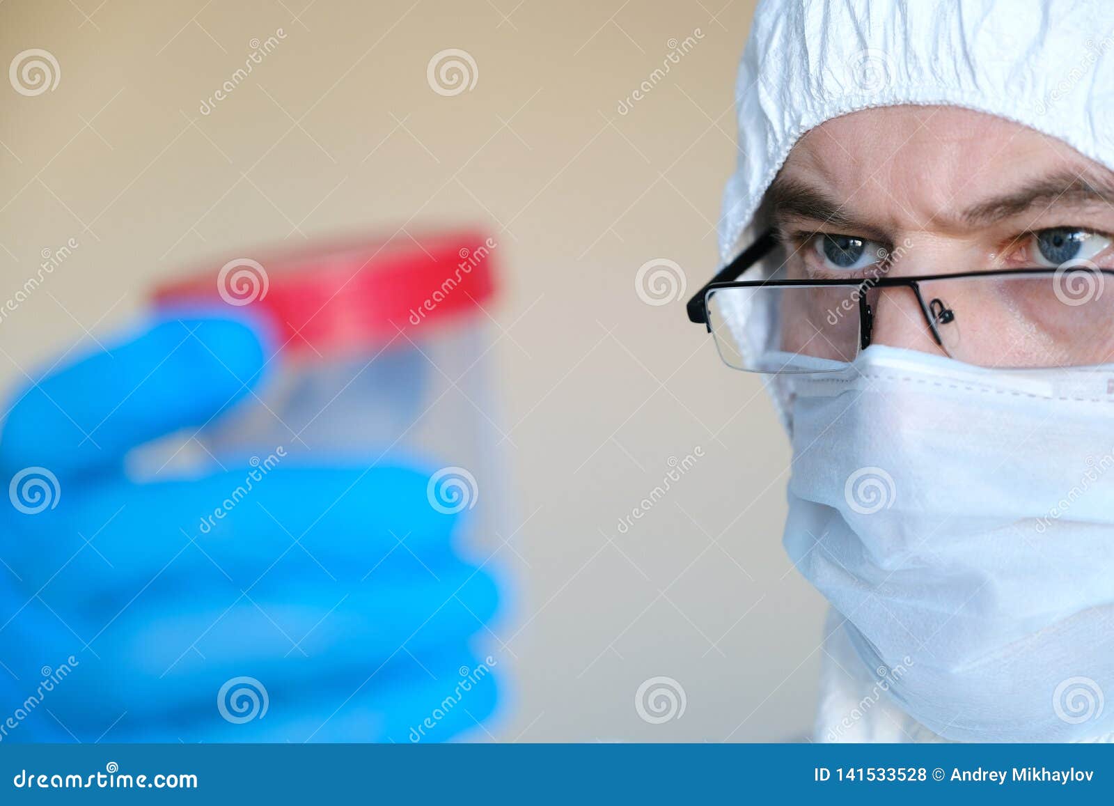 Lab Technician, Medic. Jar for Analysis. on the Face of a Protective ...