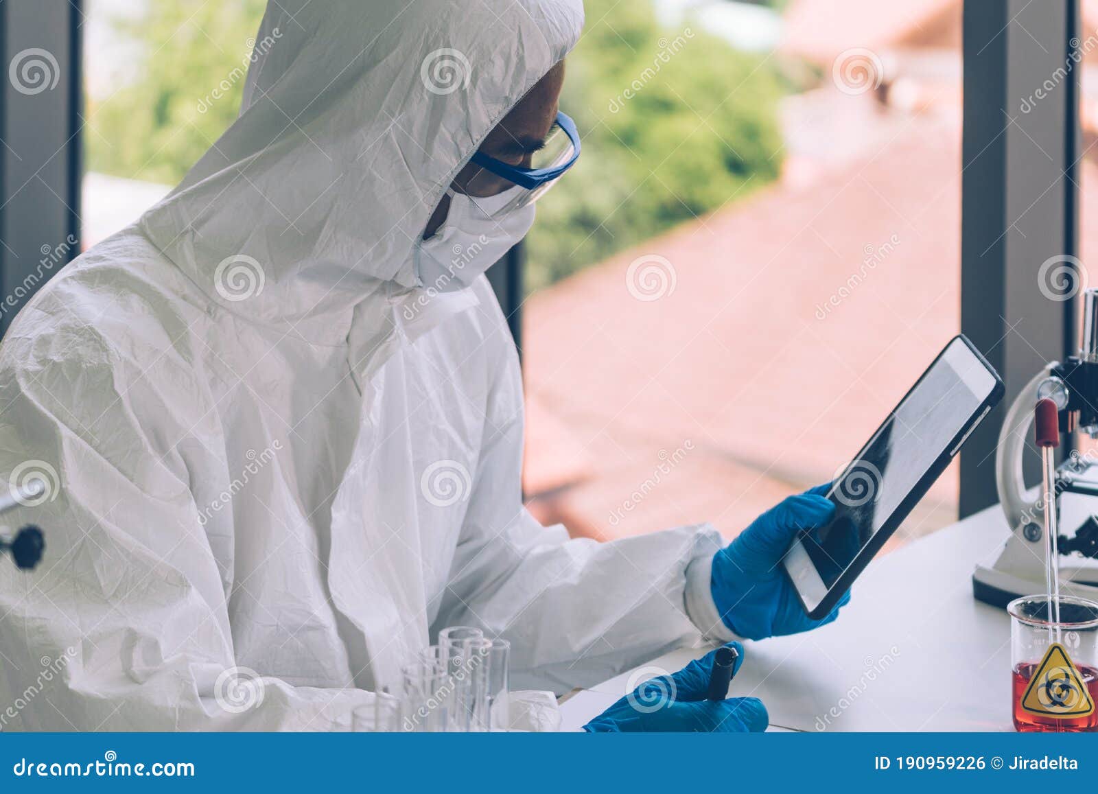 Lab Technician in Personal Protective Equipment PPE Suit Vaccines ...