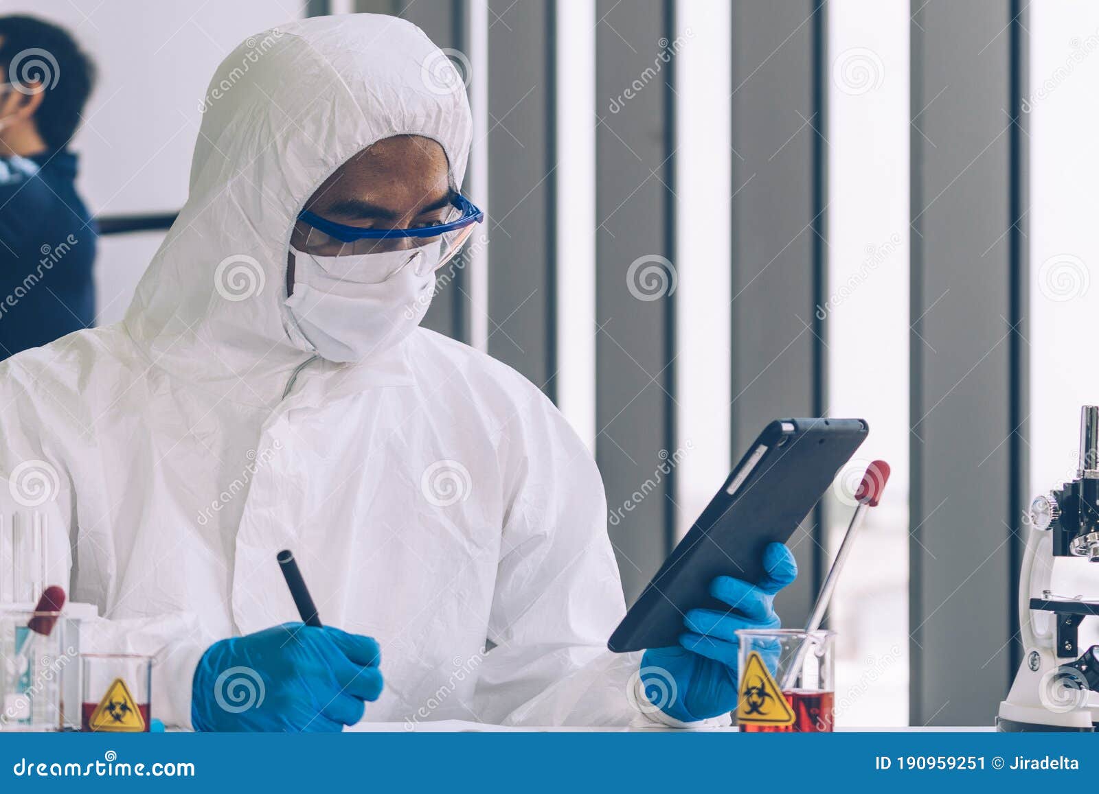 Lab Technician in Personal Protective Equipment PPE Suit Vaccines ...