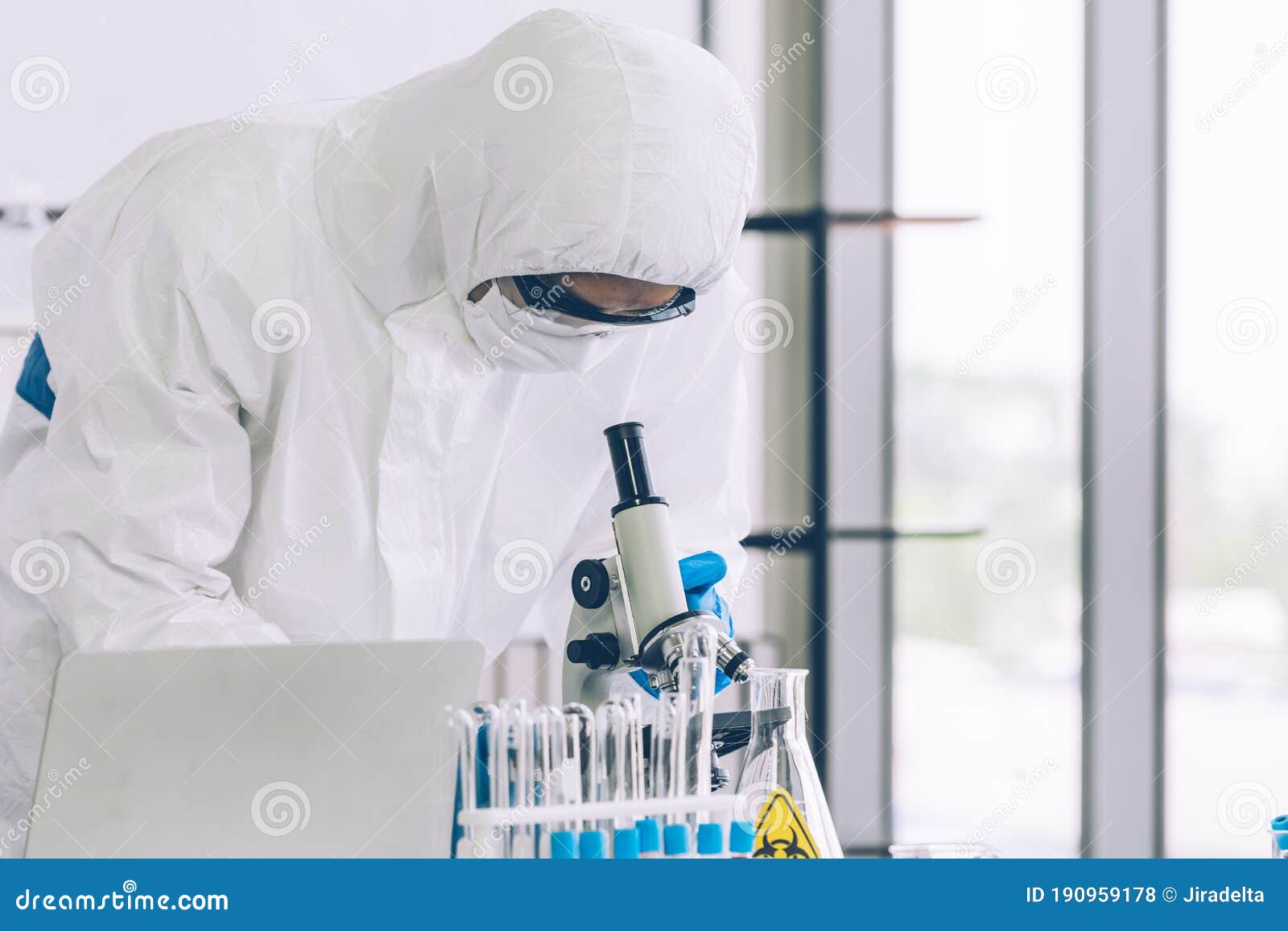 Lab Technician in Personal Protective Equipment PPE Suit Vaccines ...