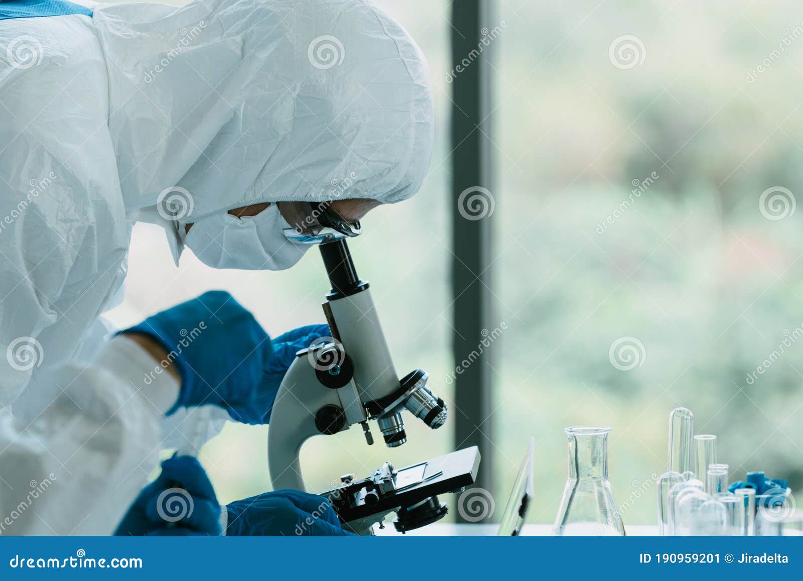 Lab Technician in Personal Protective Equipment PPE Suit Vaccines ...