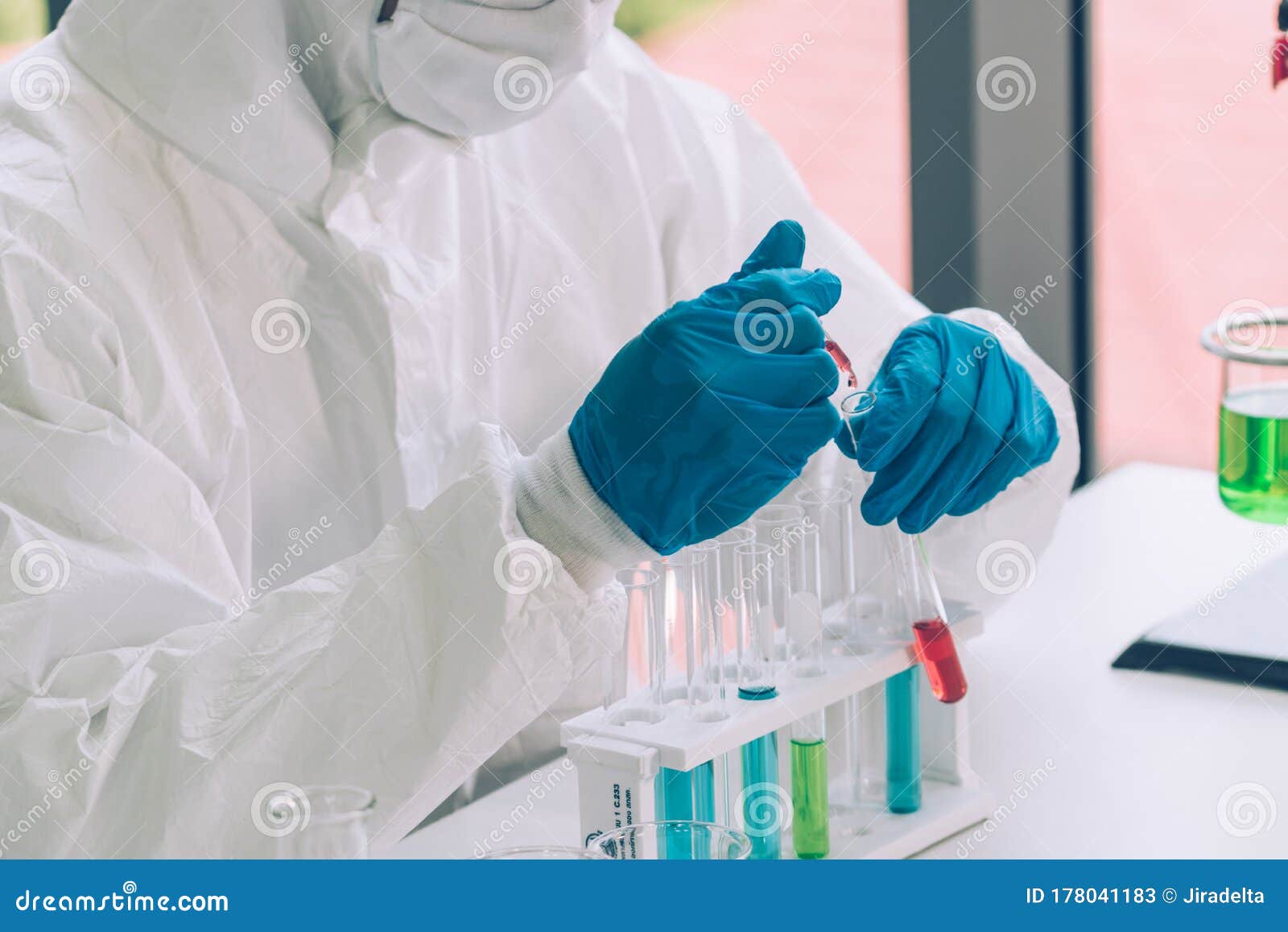 Lab Technician in Personal Protective Equipment PPE Suit Vaccines ...