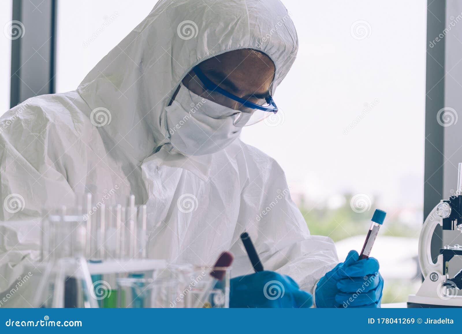 Lab Technician in Personal Protective Equipment PPE Suit Vaccines ...