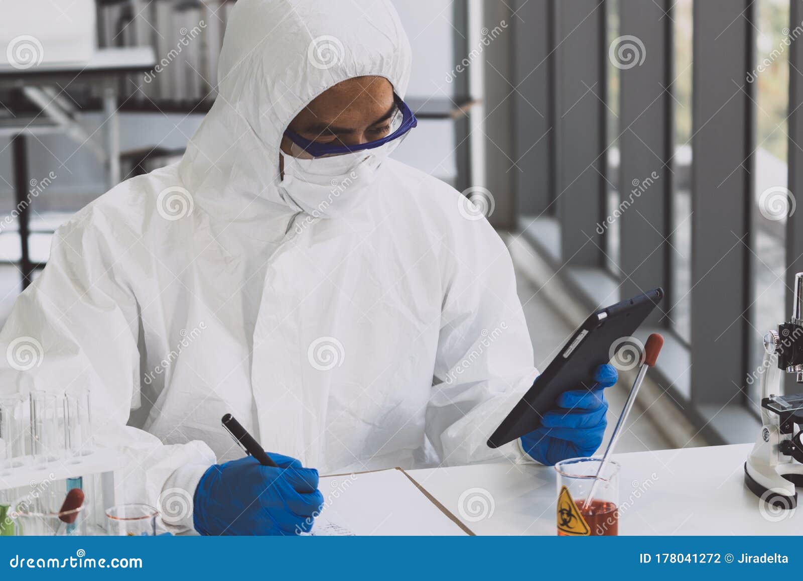 Lab Technician in Personal Protective Equipment PPE Suit Vaccines ...