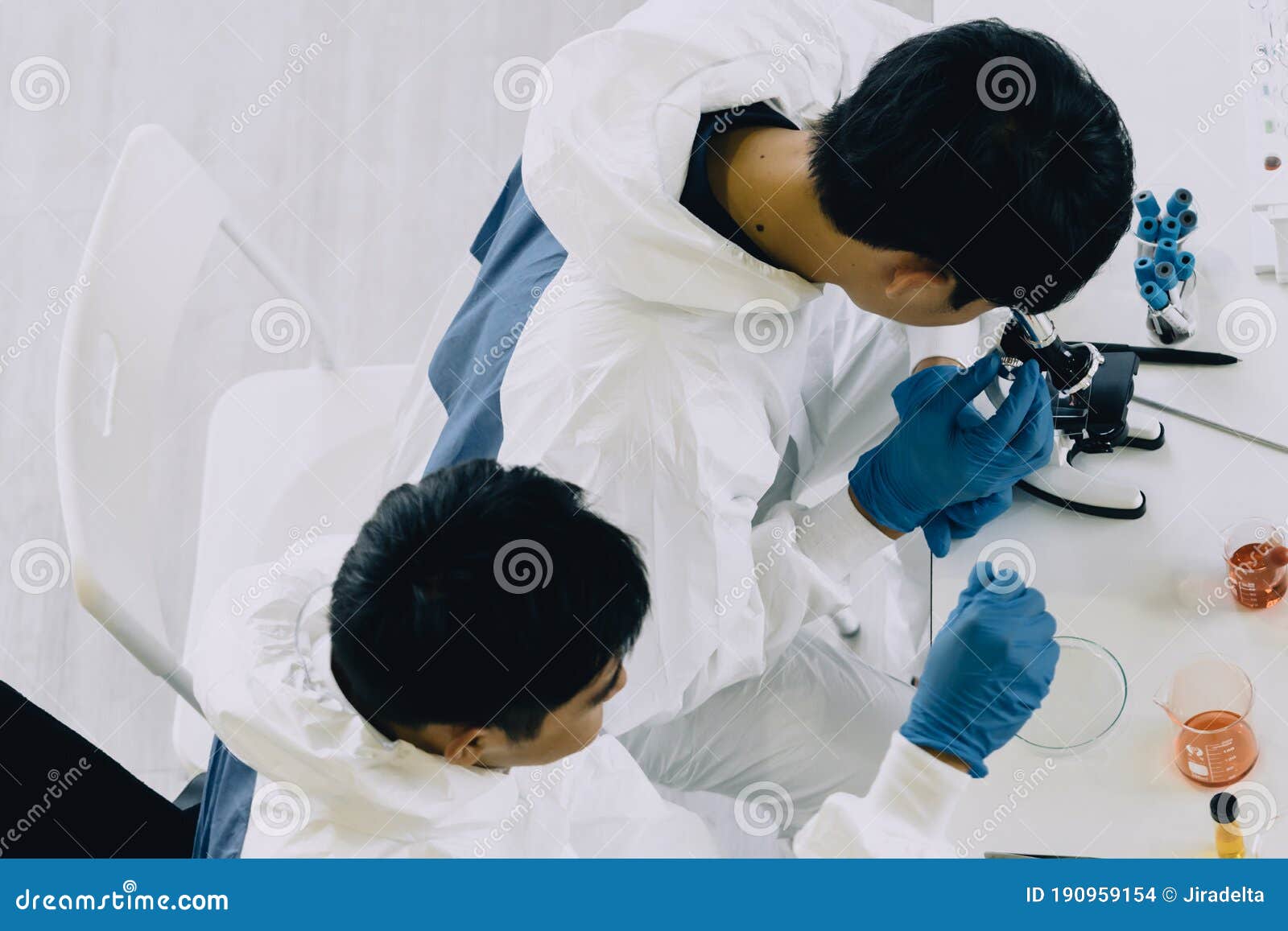 Lab Technician in Personal Protective Equipment PPE Suit Vaccines ...