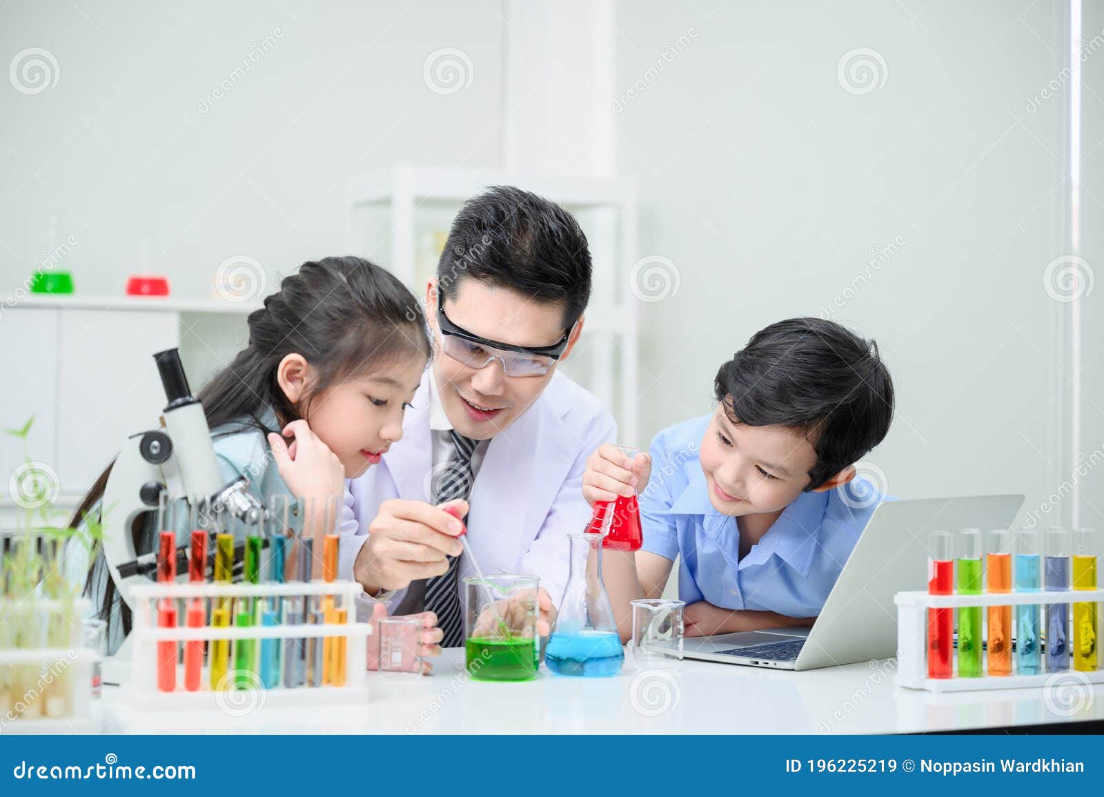 Lab Technician Showing Excited Kids a Science Experiment Stock Image ...
