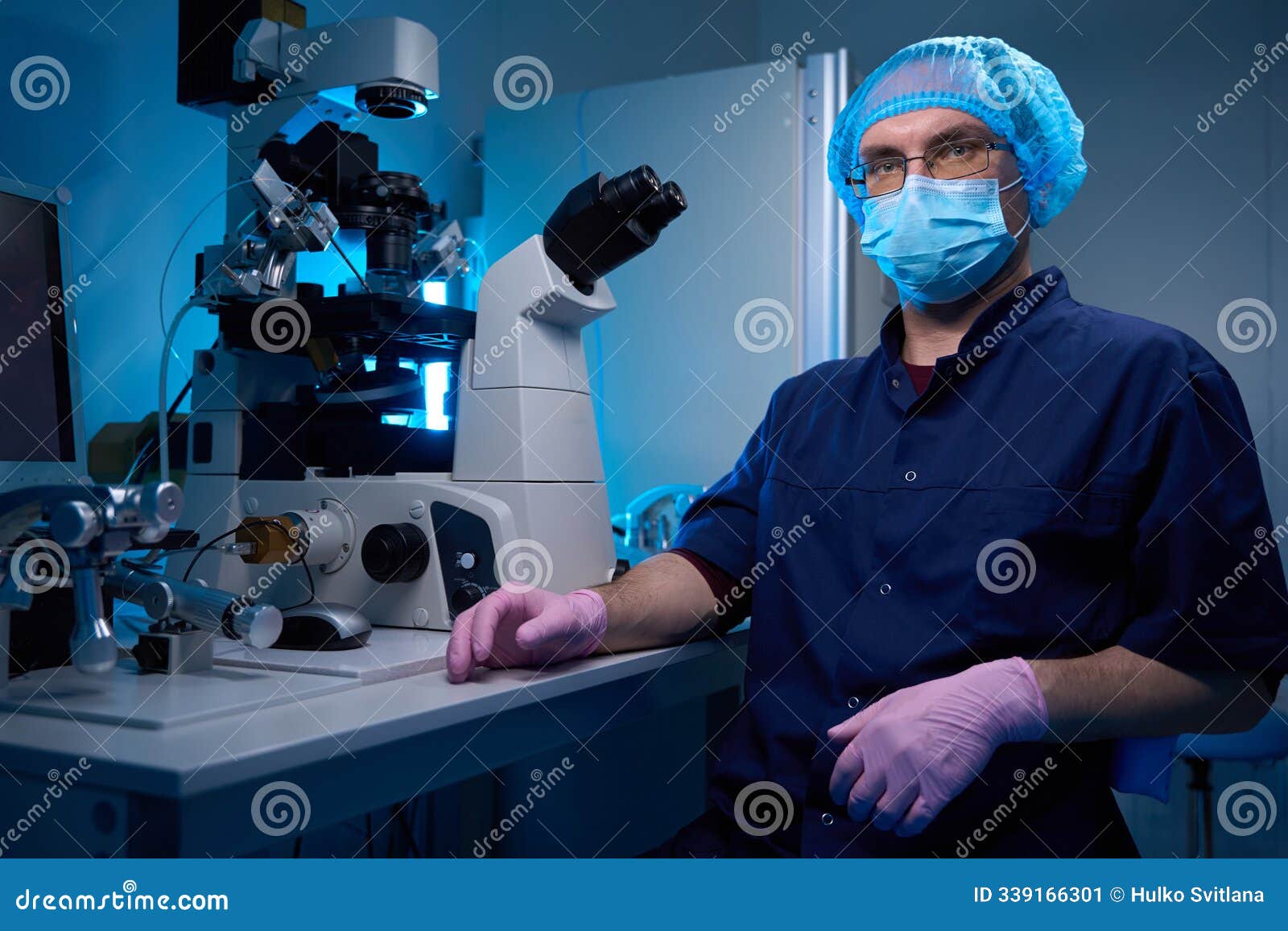 Lab Technician Sitting Near Micro-manipulation Station Stock Image ...