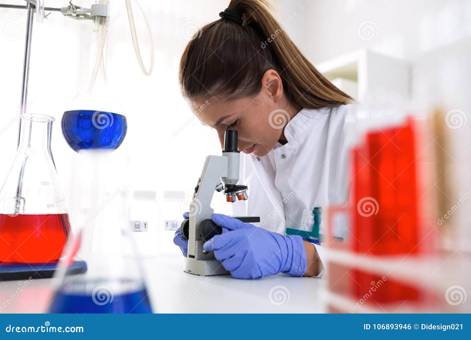Lab Technician Working on Microscope Stock Photo - Image of researcher ...