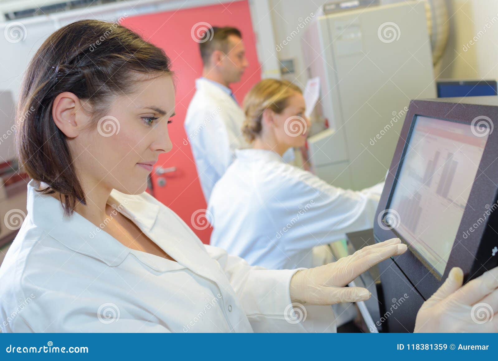 Lab technicians at work stock image. Image of computer - 118381359