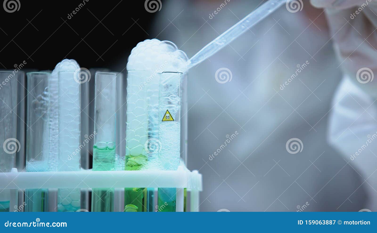Lab Worker Adding Liquid in Test Tube with Boiling Poison, Antidote ...