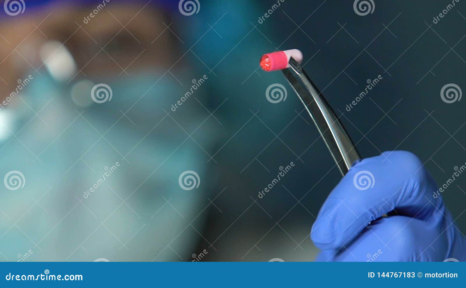 Lab Worker Holding Capsule in Forceps, Pharmaceutical Industry ...