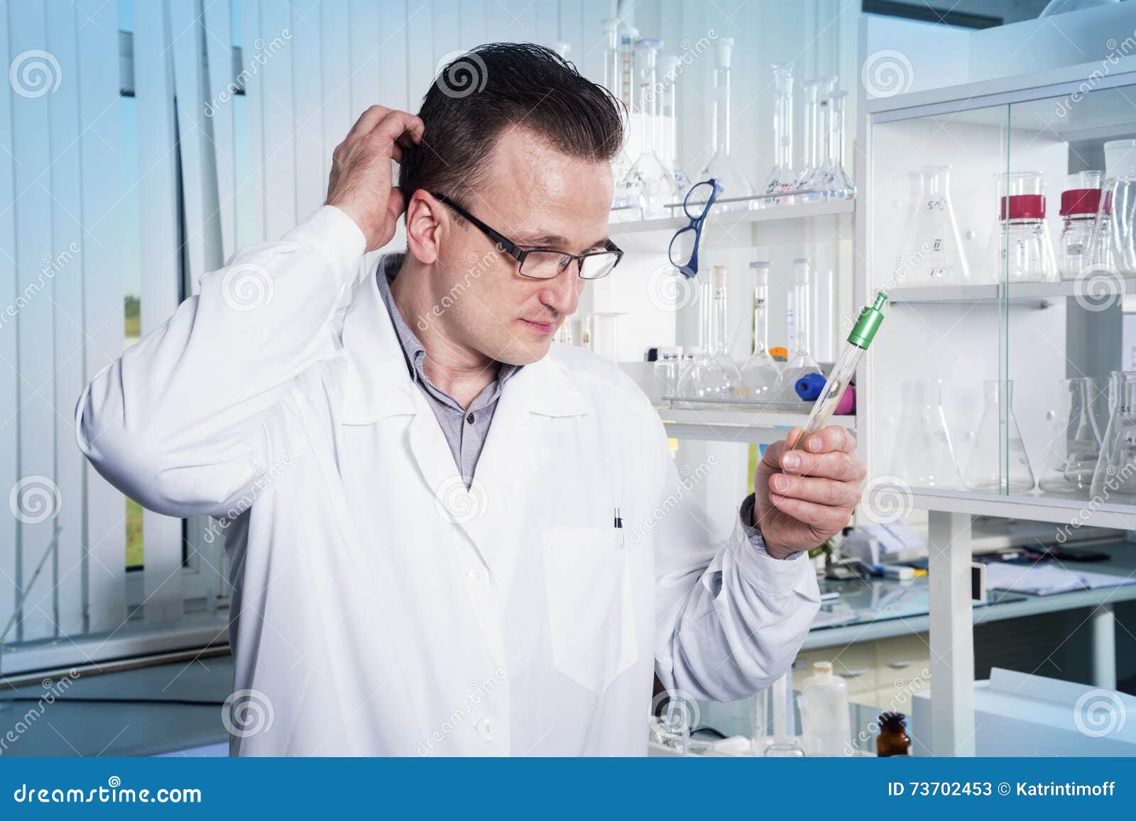 Lab Worker in Observing Test Tube with Mold at the Laboratory Stock ...