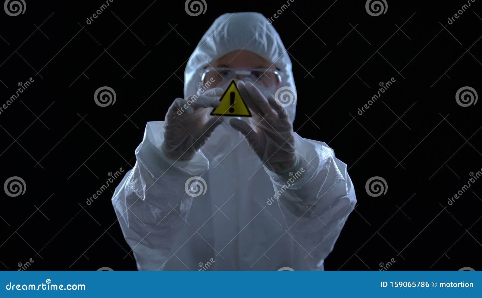 Lab Worker in Suit Holding Generic Caution Symbol in Hands, Black ...