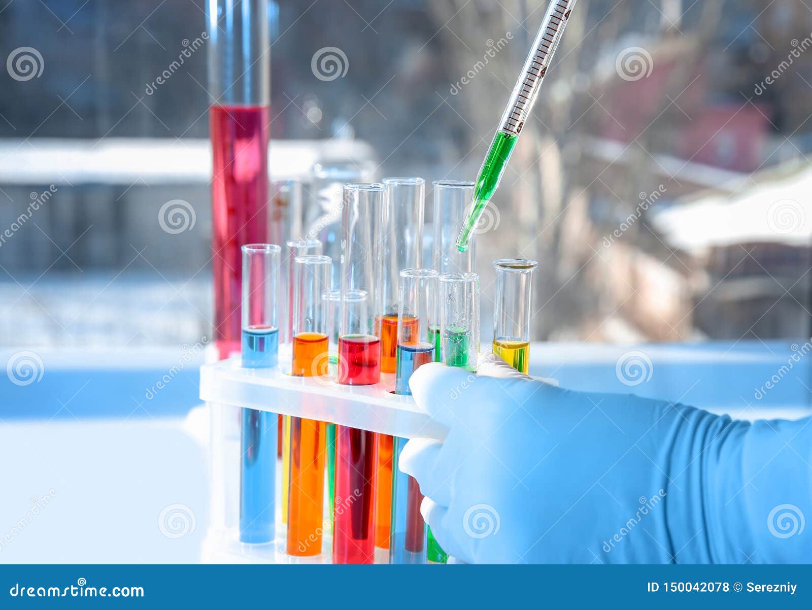 Lab Worker Taking Sample from Test Tube with Green Liquid, Closeup ...