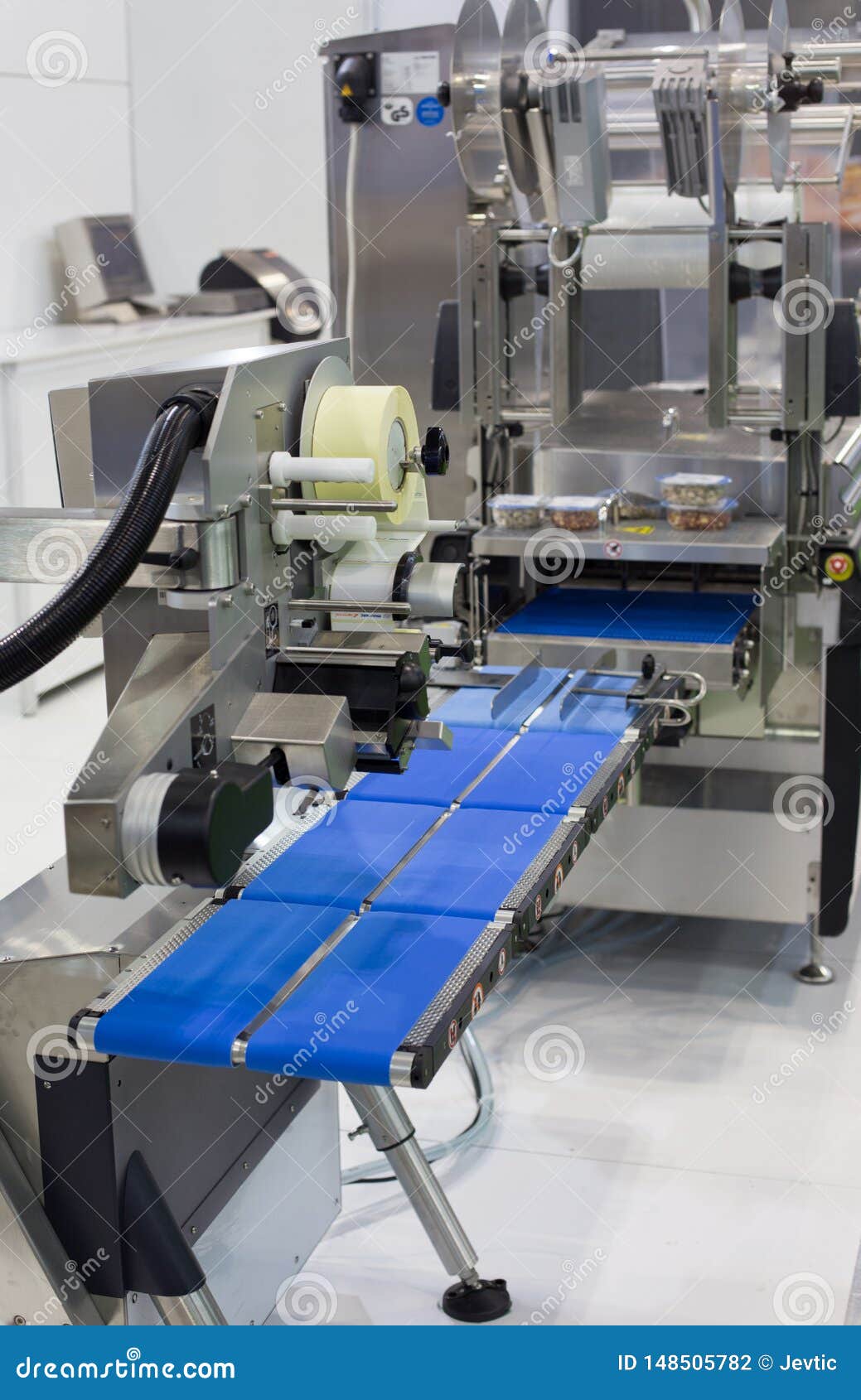Labeling Machine in Food Production Stock Photo - Image of food ...
