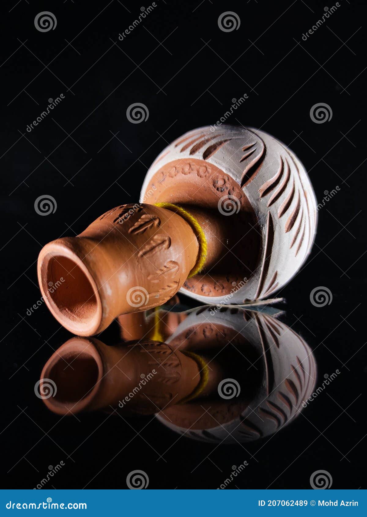 Labo Sayong With Reflection On A Black Background. Stock Photo ...