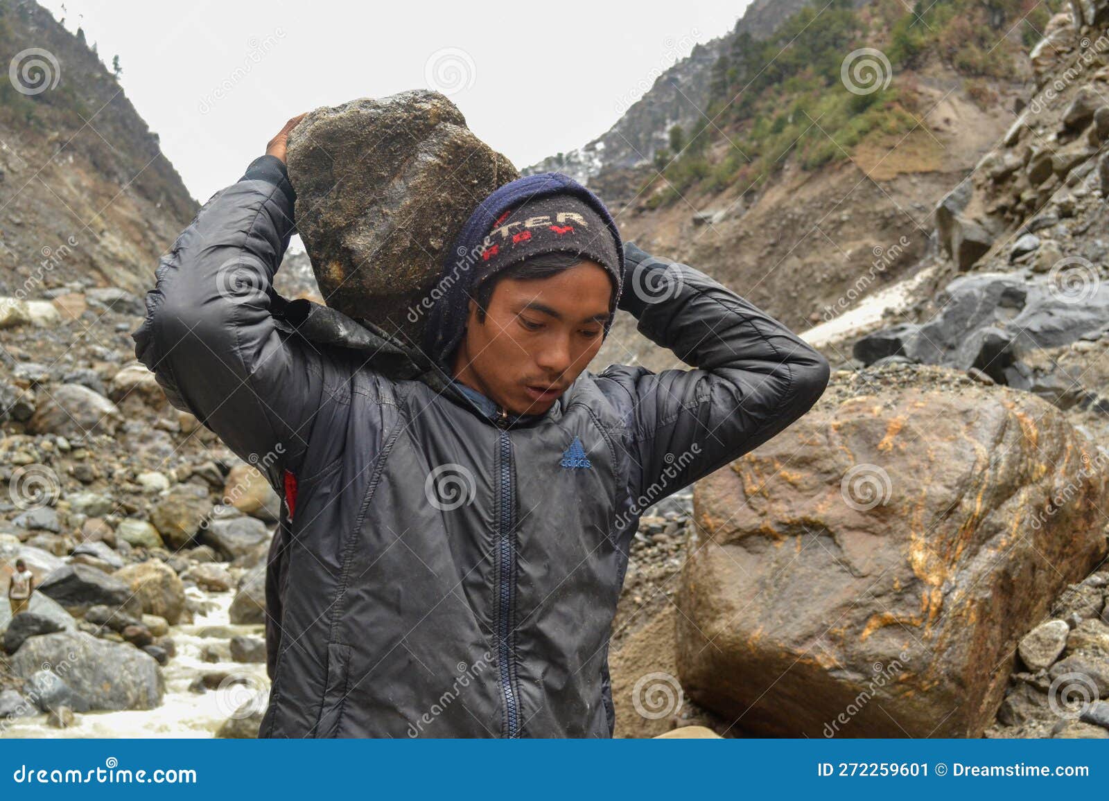 A Labor Man Taking Stone for Kedarnath Reconstruction. Editorial Photo ...