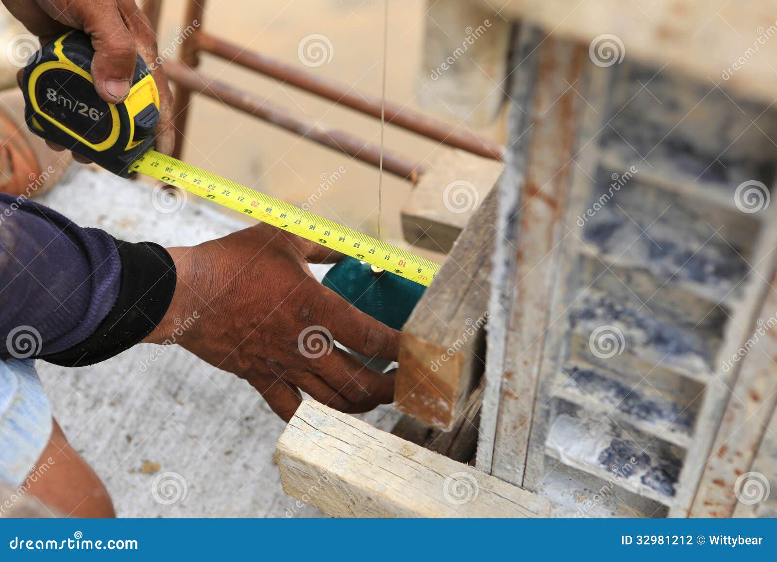 A Labor Man Using a Plumb Bob for Check Stock Photo - Image of layer ...