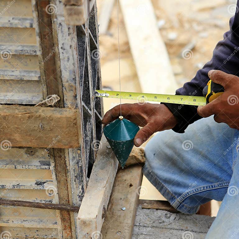Labor Man Using a Plumb Bob for Check Stock Image - Image of industrial ...