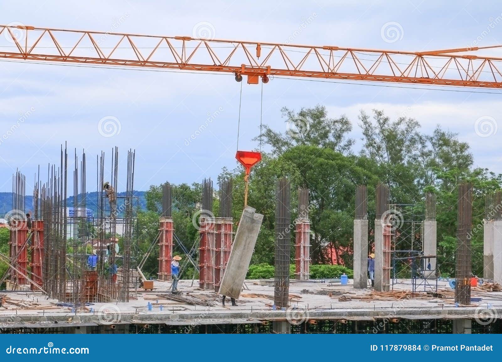 Labor Working and Crane Hook in Big Construction Site in Develop City ...