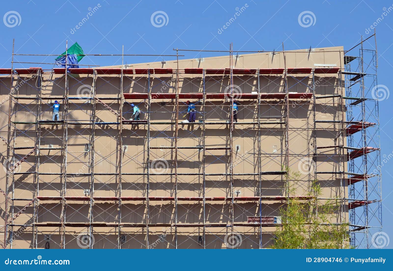 Labor Working on High Scaffold in Construction Site Stock Photo - Image ...