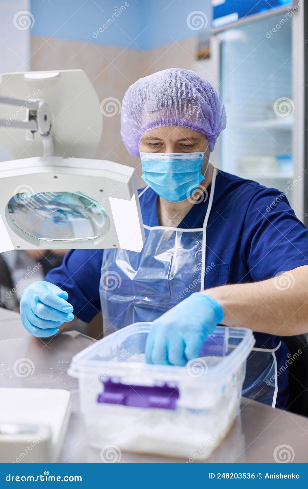 A Laboratory Assistant Conducts Research with Biomaterial in the ...