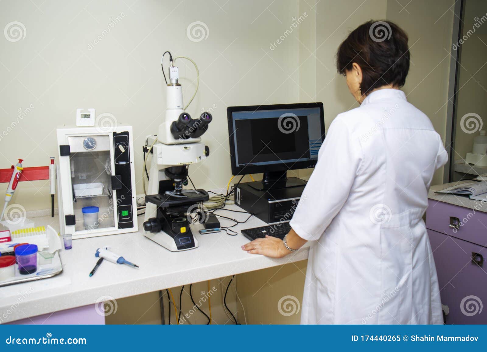 Laboratory Assistant Performs a Blood Test in a Modern Laboratory on ...