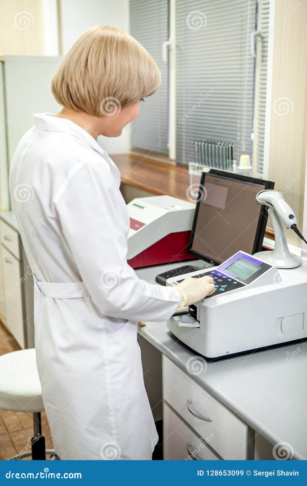 Laboratory Assistant Selects the Mode of Operation of the Apparatus for ...