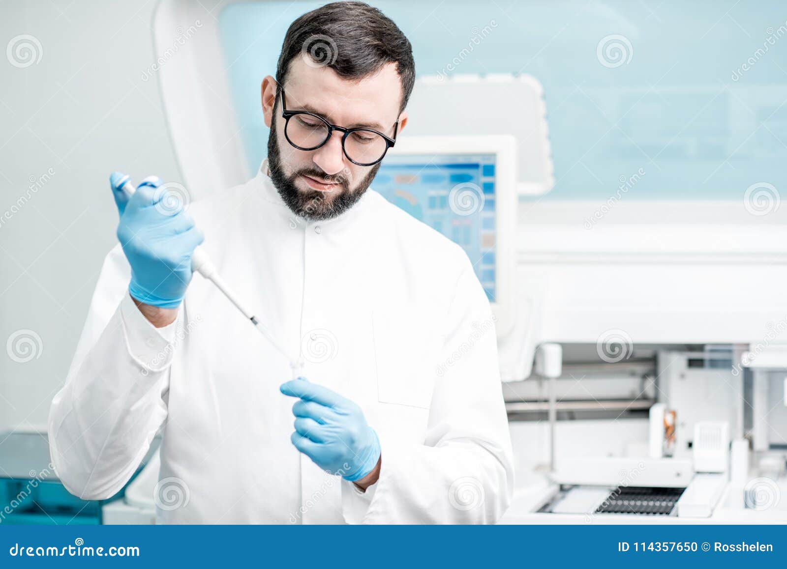 Laboratory Assistant with Test Tube in the Laboratory Stock Photo ... Laboratory Assistant with Test Tube in the Laboratory Stock Photo ...