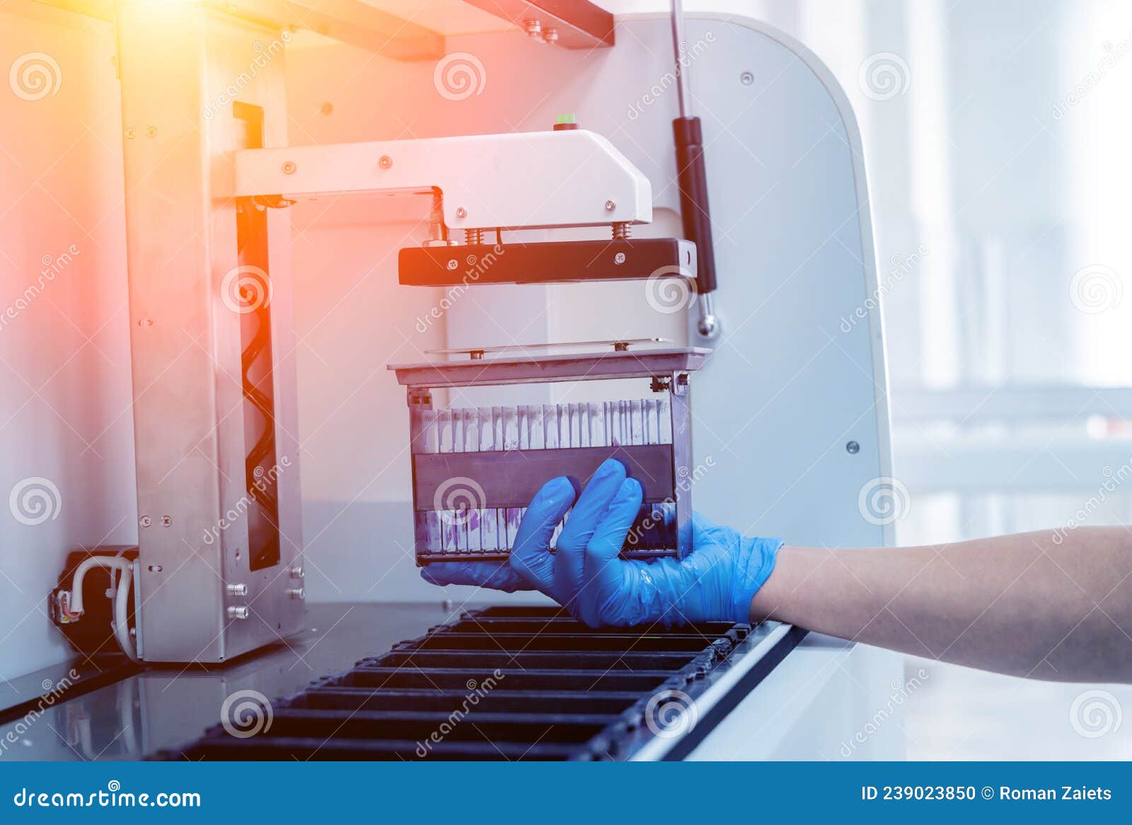 Laboratory Assistant Works with Automatic Multi Slides Stainer at the ...
