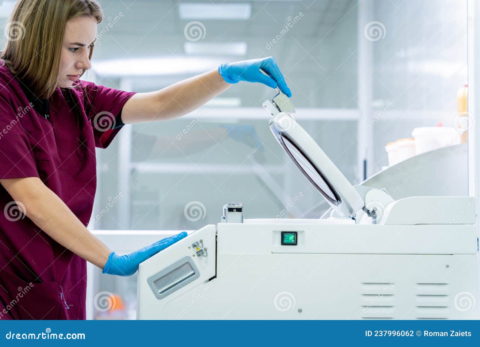 Laboratory Assistant Works with Microwave Hybrid Tissue Processor at ...