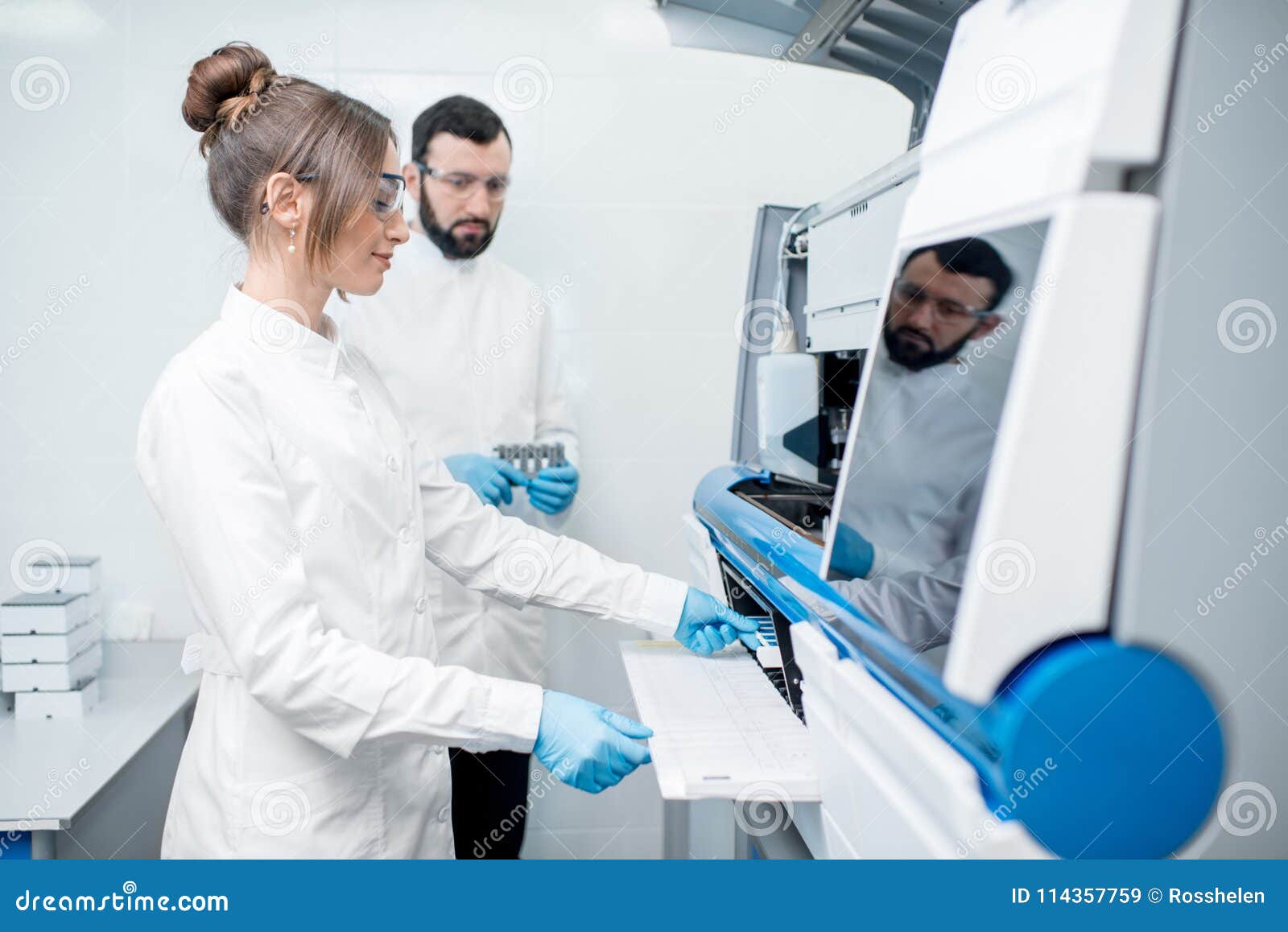 Laboratory Assistants Working with Analizer Stock Image - Image of ... Laboratory Assistants Working with Analizer Stock Image - Image of ...
