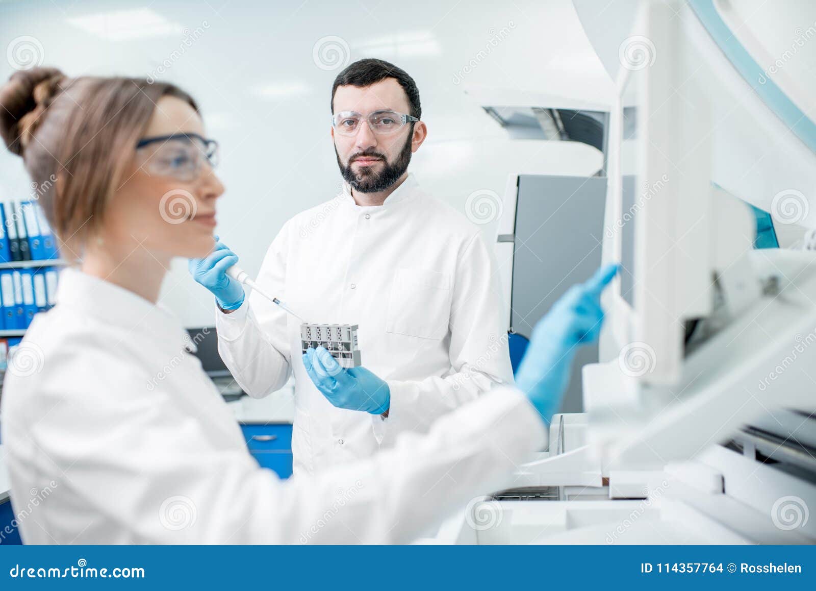 Laboratory Assistants Working with Analizer Stock Photo - Image of ... Laboratory Assistants Working with Analizer Stock Photo - Image of ...