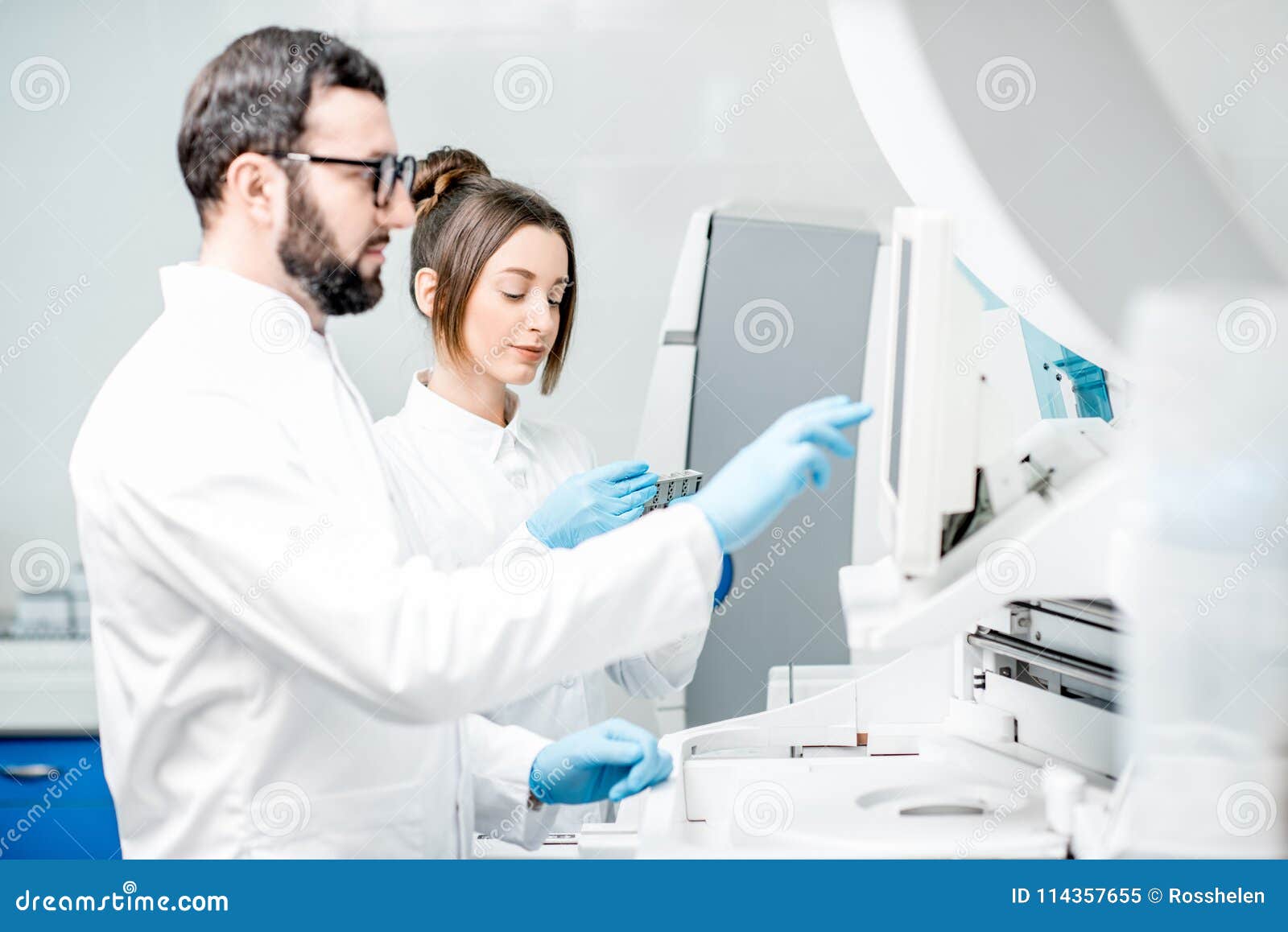 Laboratory Assistants Working with Analizer Stock Image - Image of ... Laboratory Assistants Working with Analizer Stock Image - Image of ...