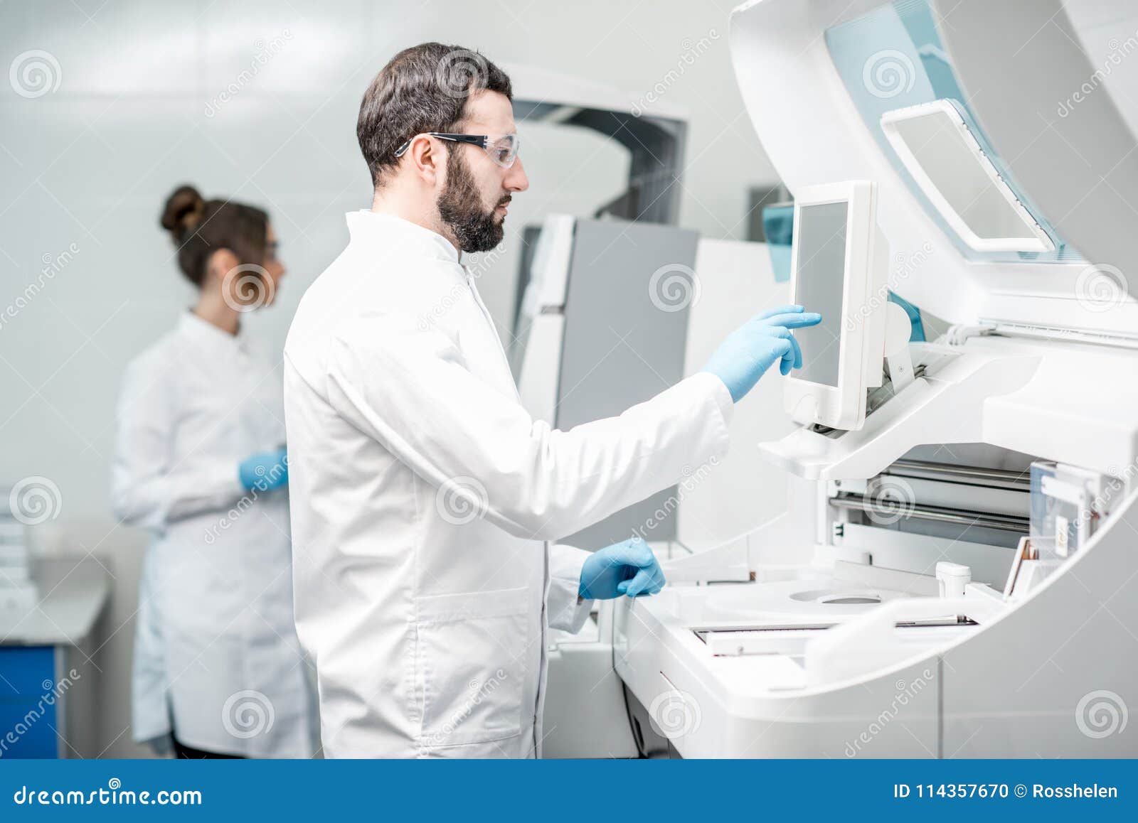 Laboratory Assistants Working with Analizer Stock Photo - Image of ... Laboratory Assistants Working with Analizer Stock Photo - Image of ...