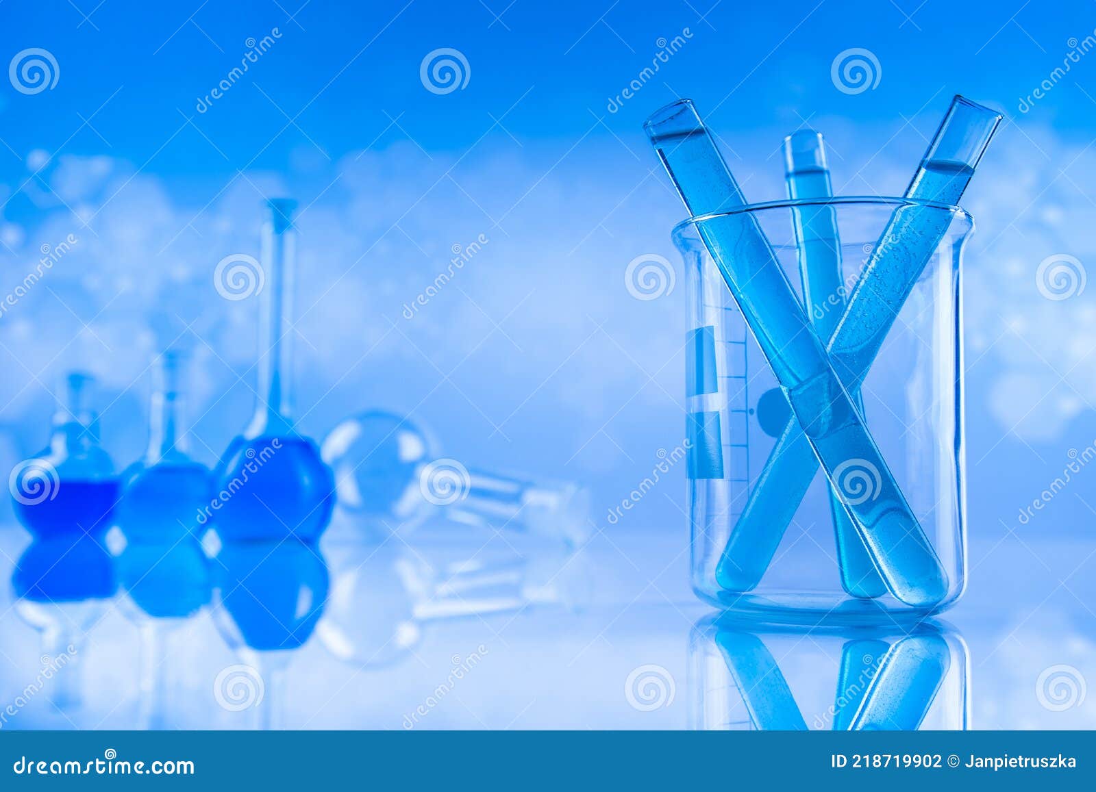 Laboratory Beakers, Microscope, Blue Background Stock Photo - Image of ...