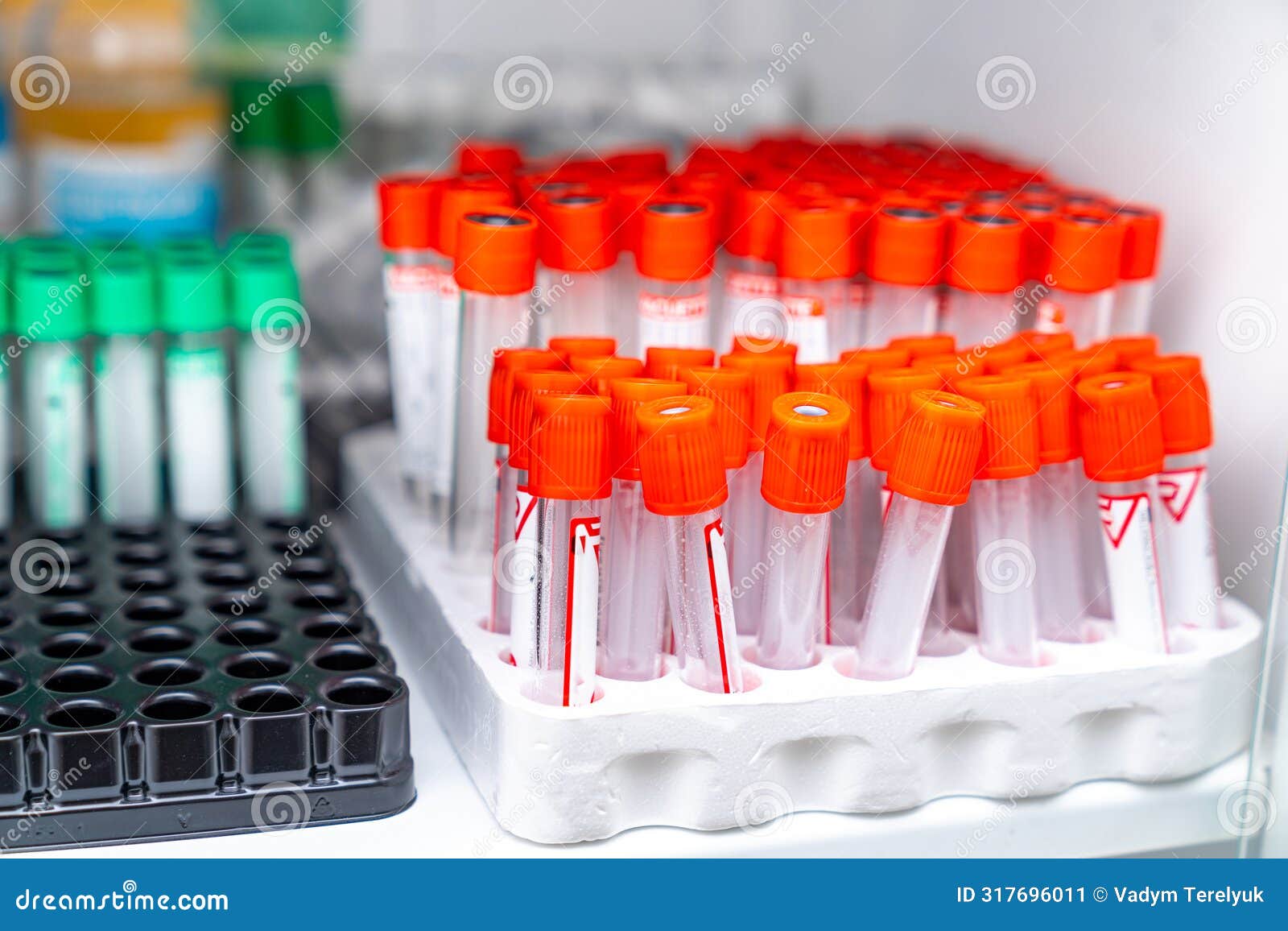 Laboratory Containers for Blood. Stack of Blood Test Tubes Stock Image ...