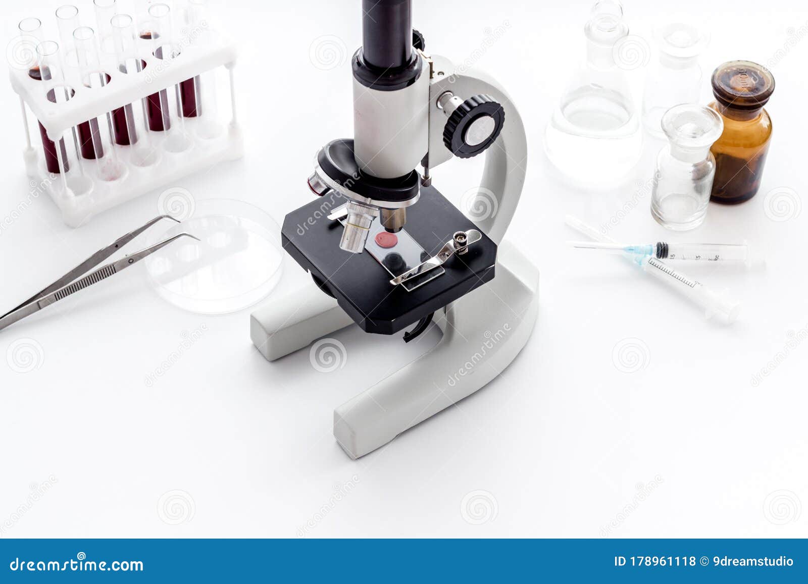 Laboratory Examination with Microscope. Equipment with Blood Sample on ...