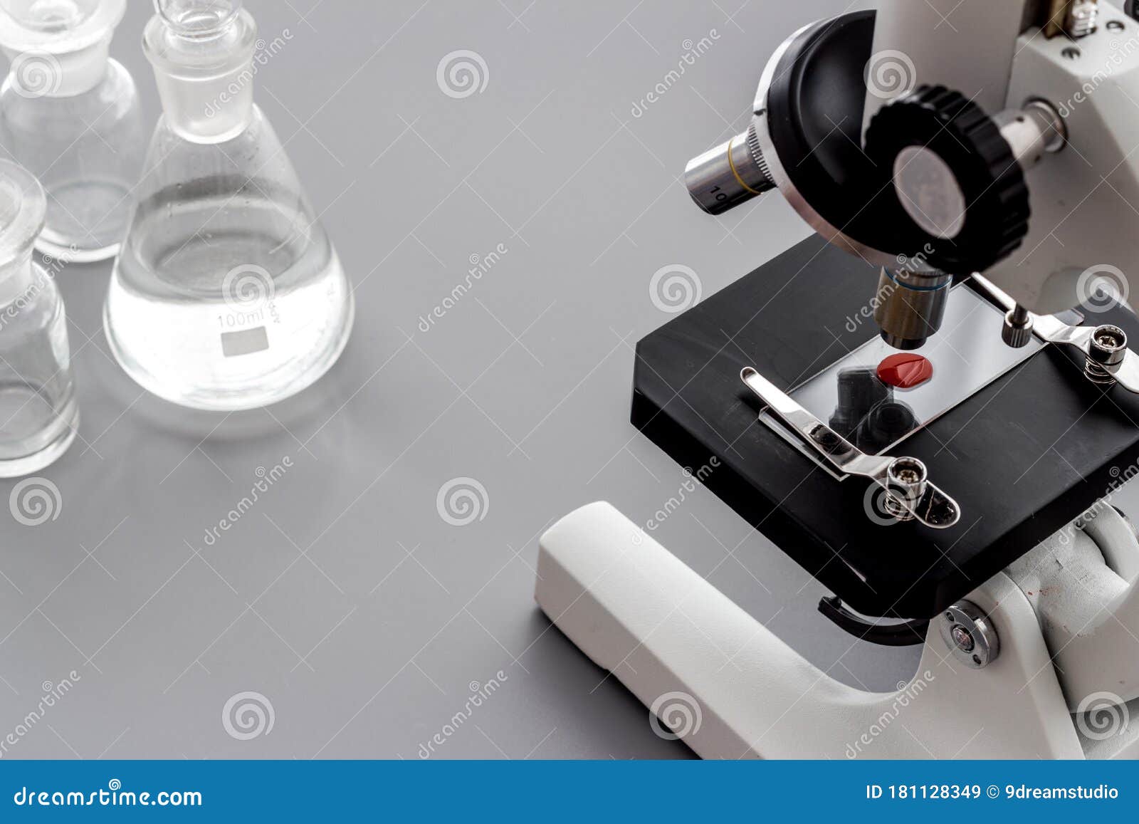 Laboratory Examination with Microscope. Equipment on Grey Background ...