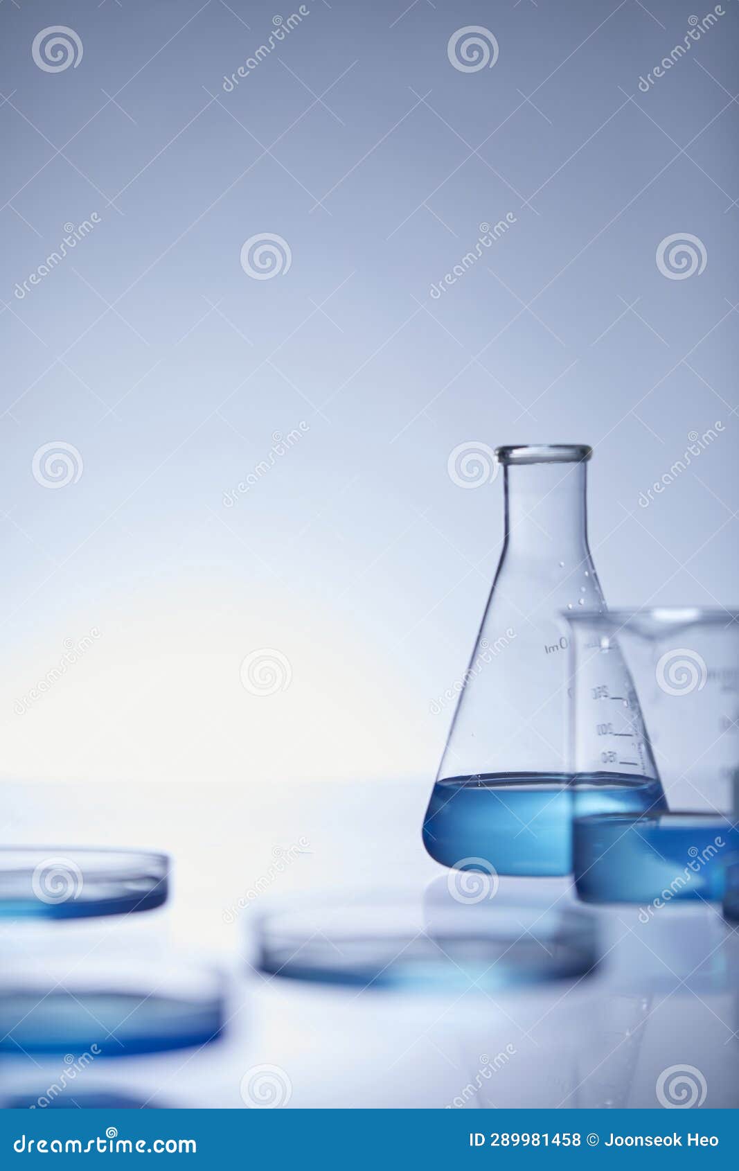 Laboratory Flask with Blue Liquid Stock Photo - Image of perfume, clear ...