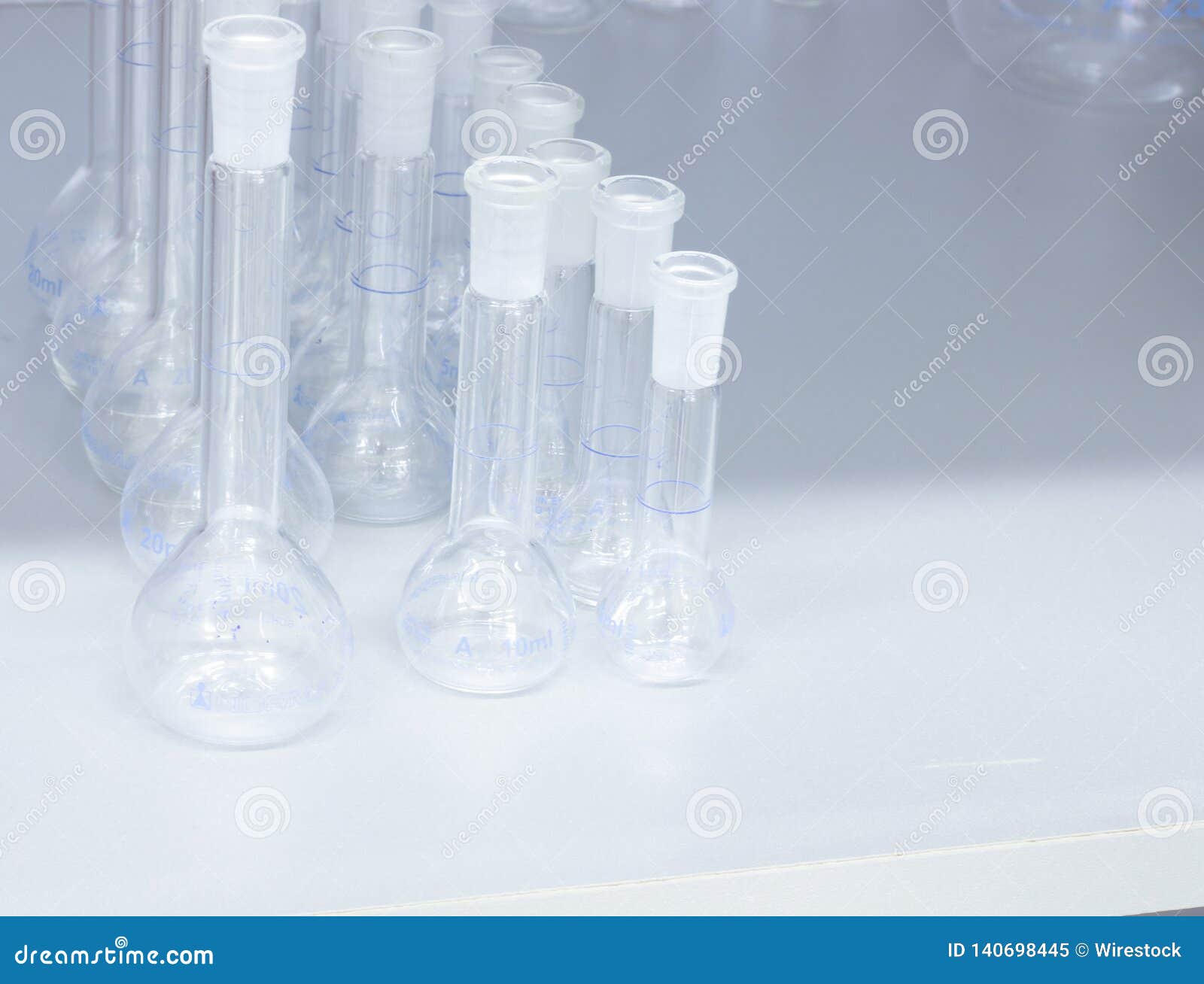 Laboratory flasks stock image. Image of blue, biology - 140698445