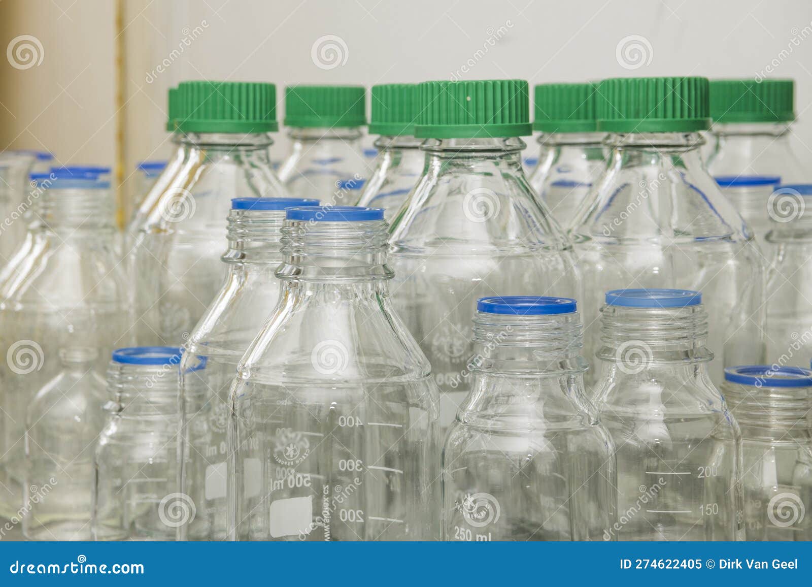 Laboratory Glass Flasks with Green Caps. Science Laboratory Stock Image ...
